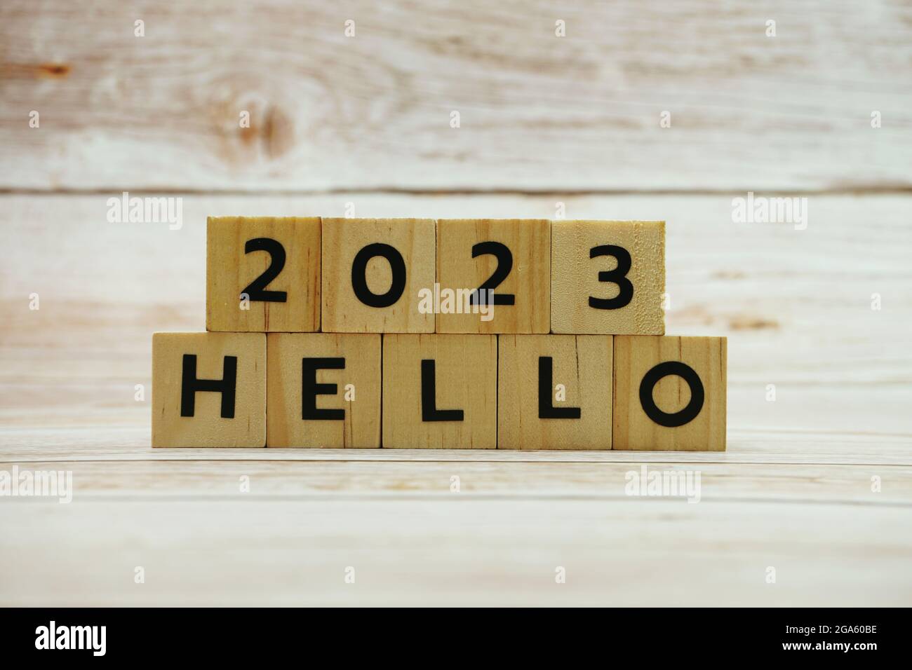 Hello 2023 alphabet letters on wooden background Stock Photo - Alamy