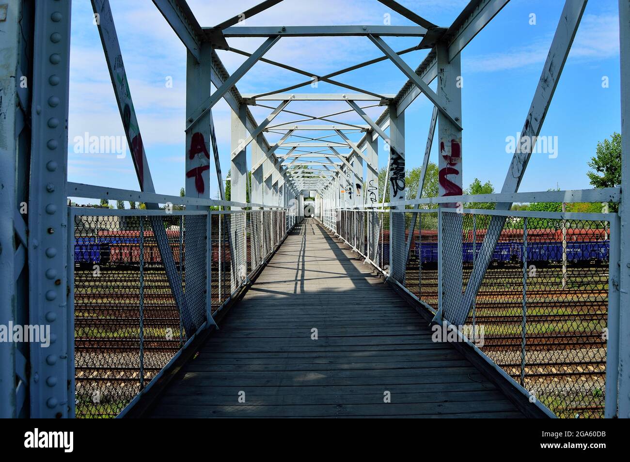 Metal structure of a pedestrian bridge. Sky Stock Photo - Alamy