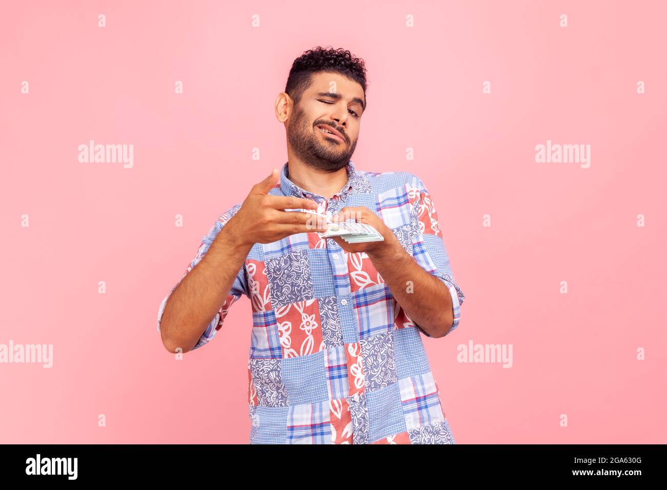 Profile portrait of self confident young adult handsome man with beard ...