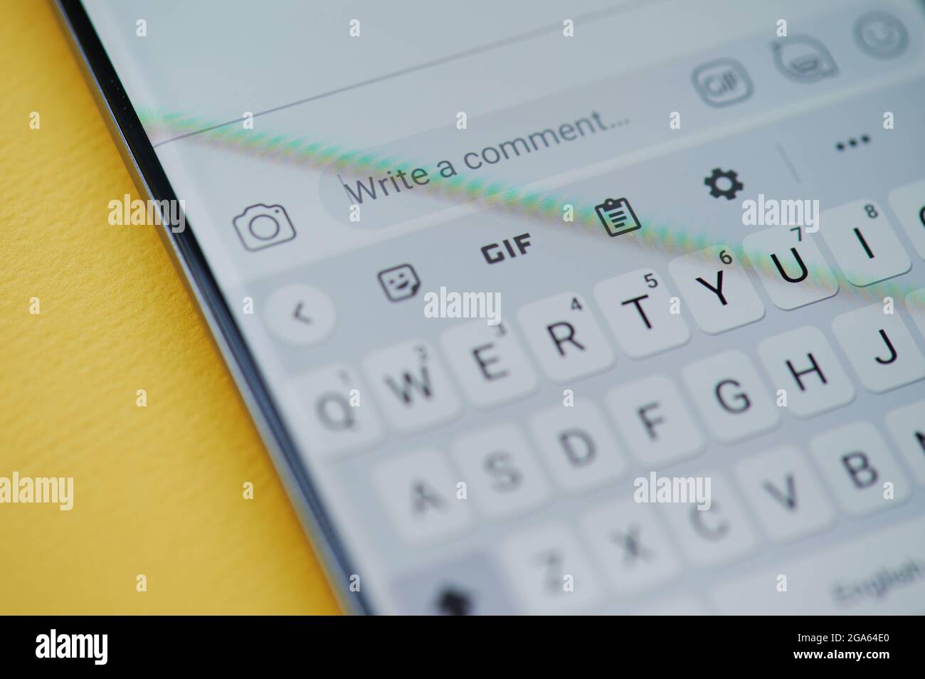 New york, USA - June 24 2021: Writing comment on smartphone menu screen ...