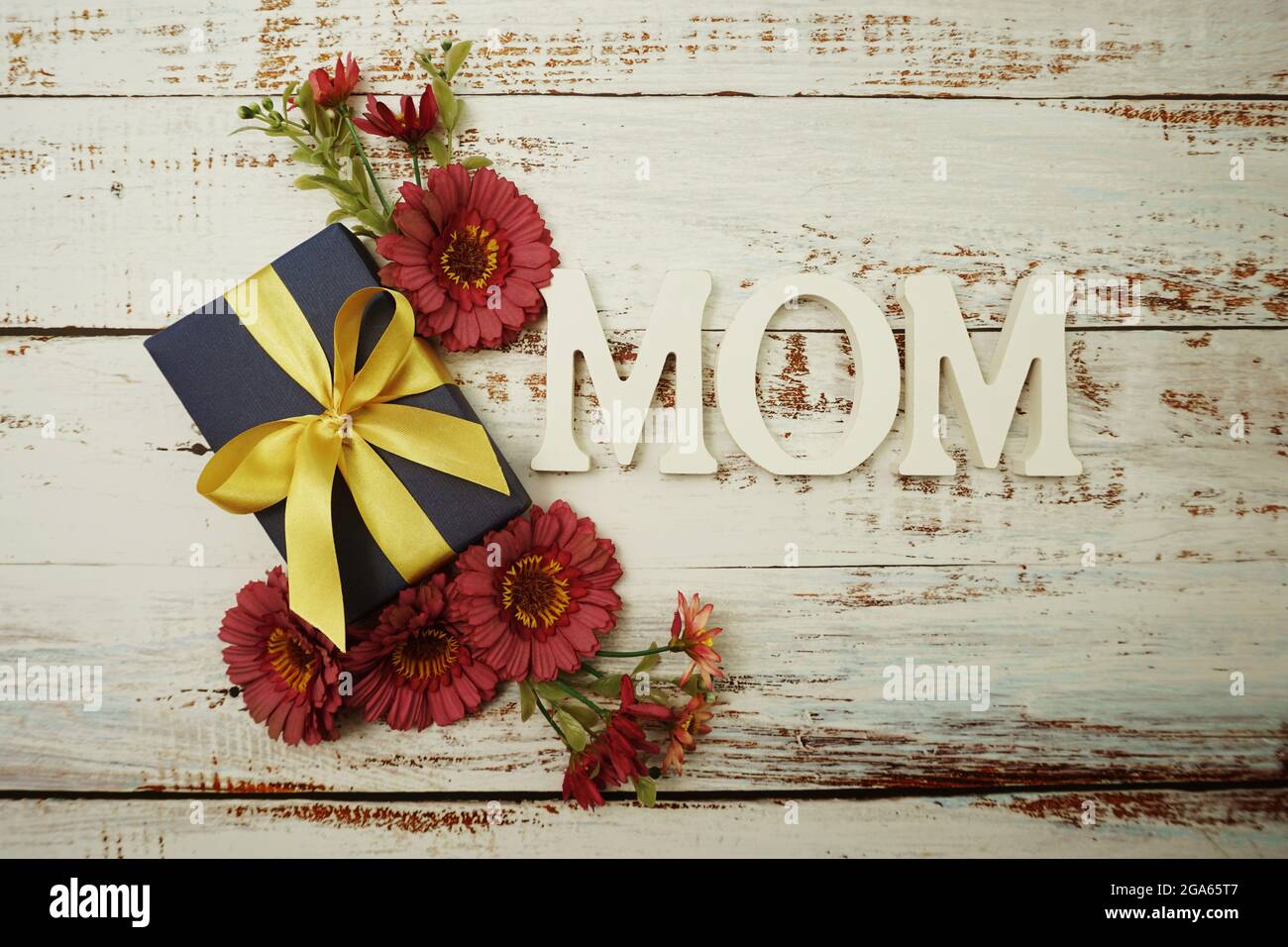 Mother's day background with Mom alphabet letters and Flowers and gift ...