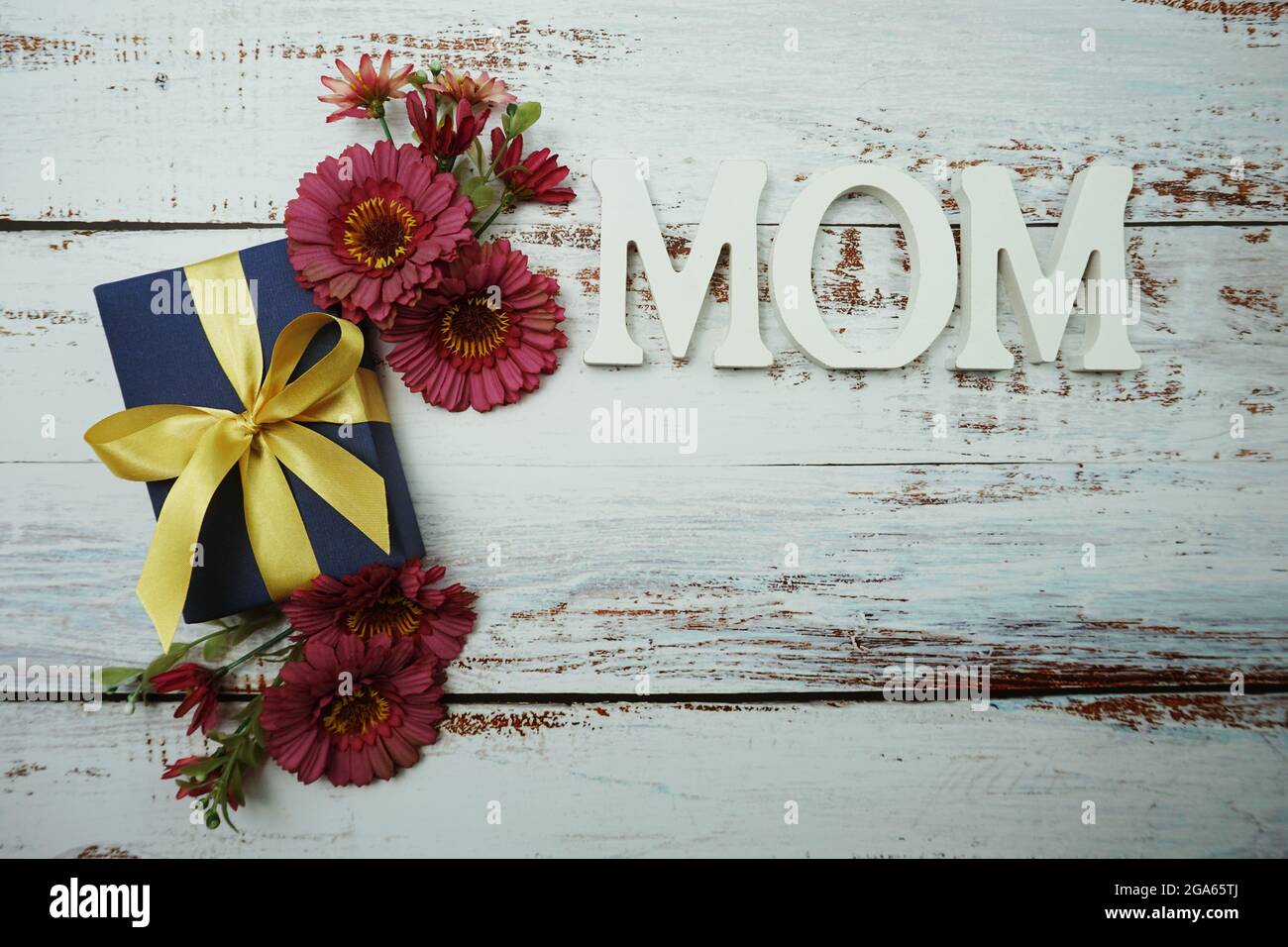 Mother's day background with Mom alphabet letters and Flowers and gift ...