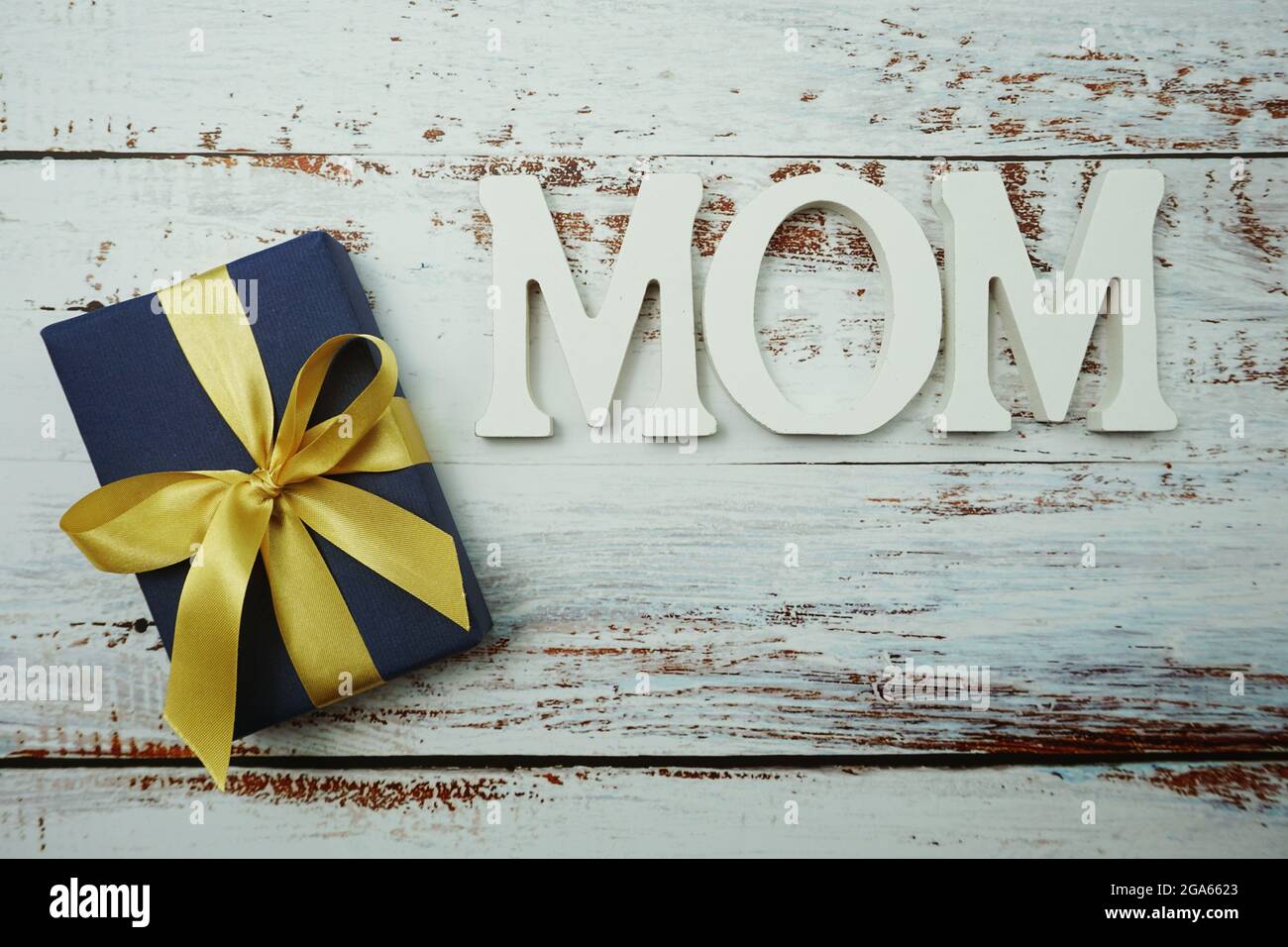 Mother's day background with Mom alphabet letters Decoration with gift ...