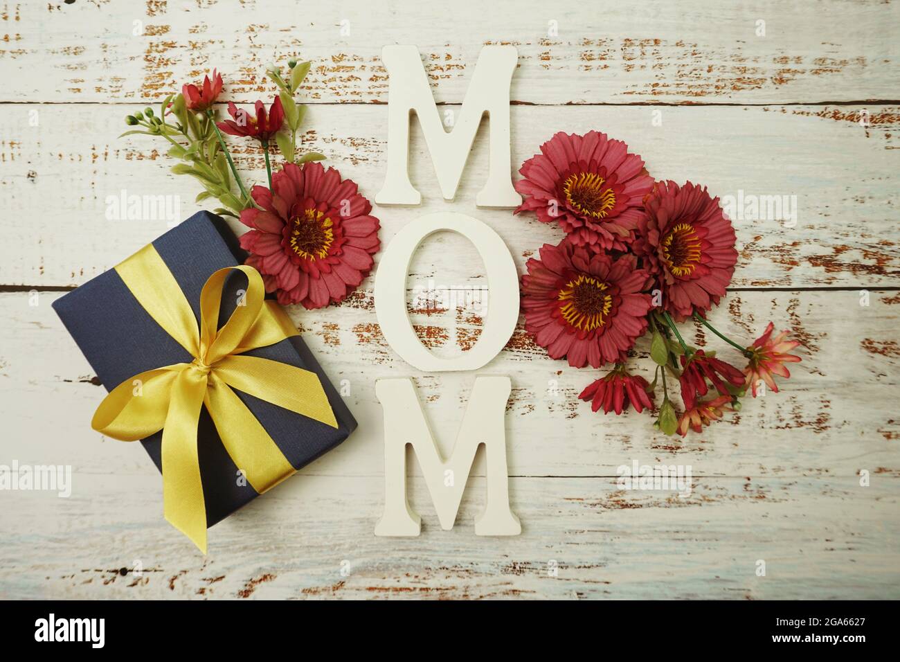 Mother's day background with Mom alphabet letters and Flowers and gift ...