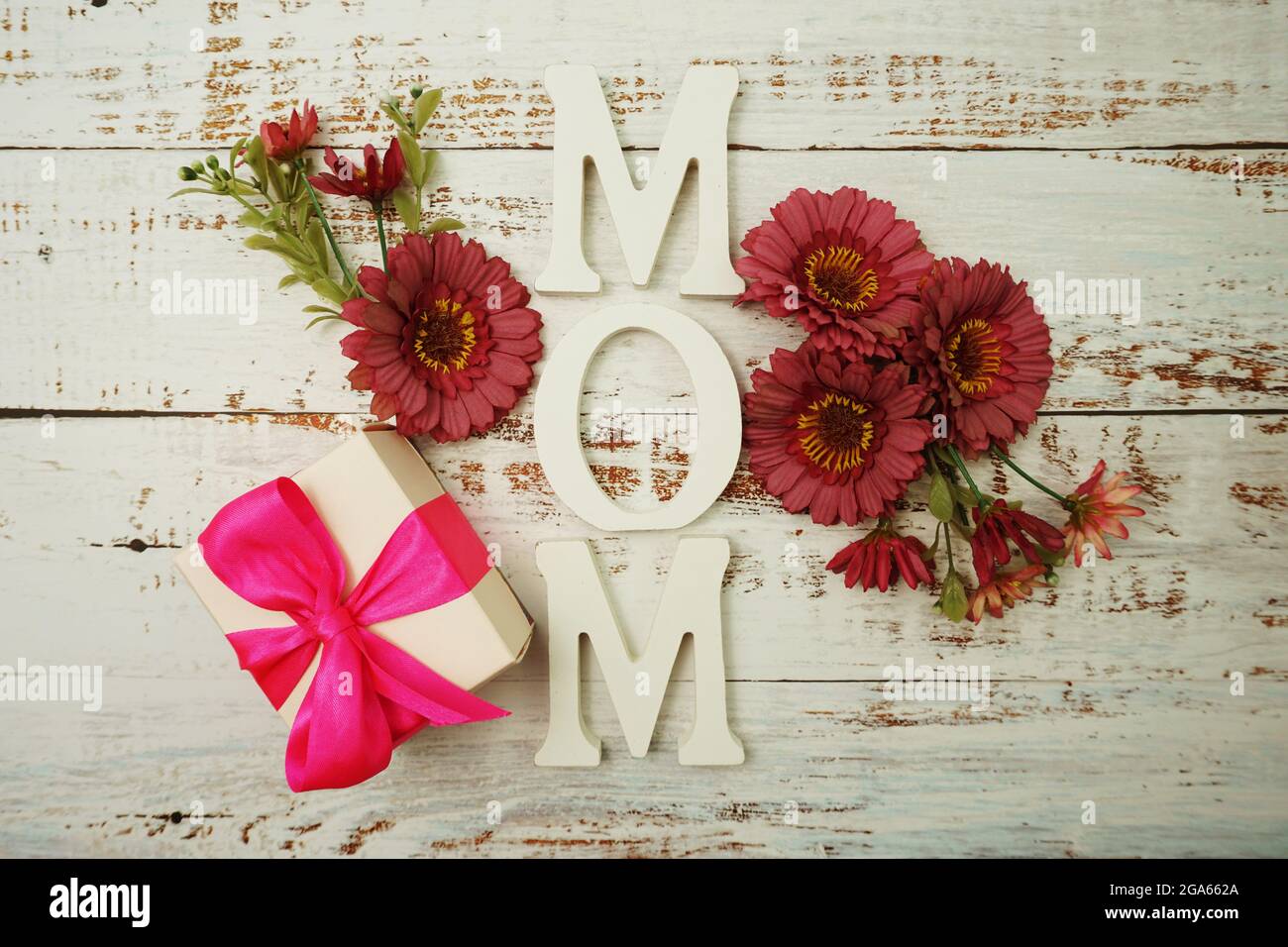 Mother's day background with Mom alphabet letters and Flowers and gift ...