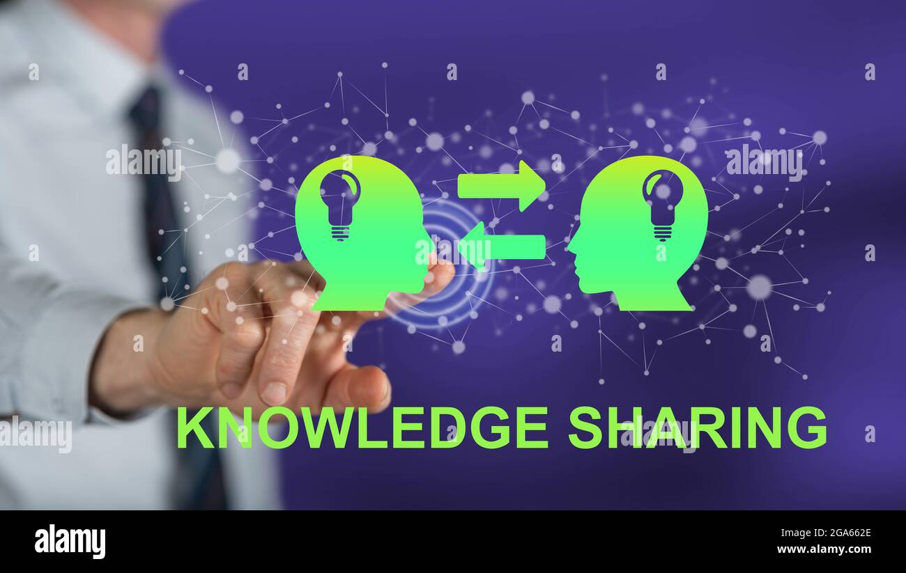 Man touching a knowledge sharing concept on a touch screen with his finger Stock Photo - Alamy