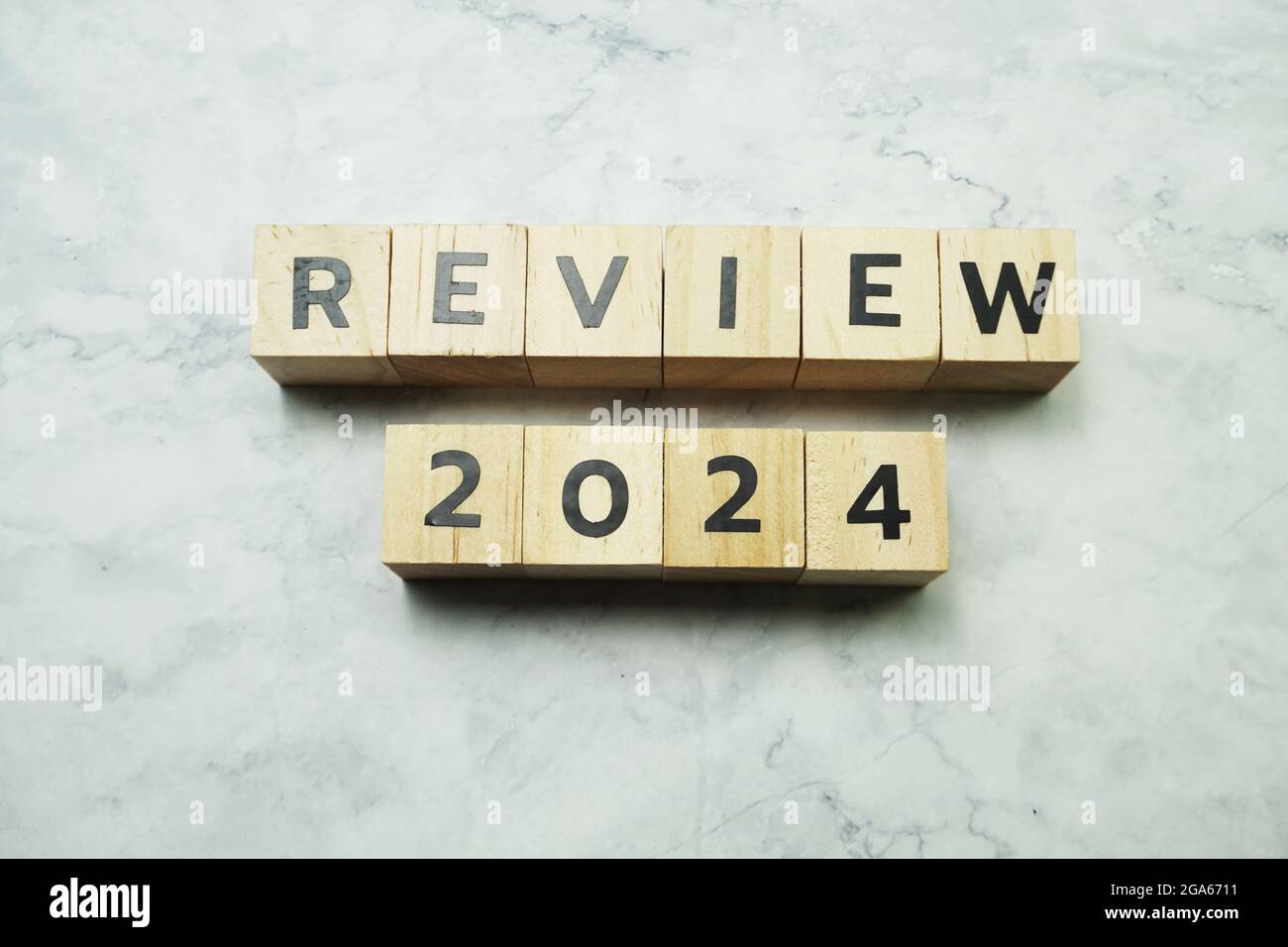 Review 2024 word alphabet letters on marble background Stock Photo - Alamy