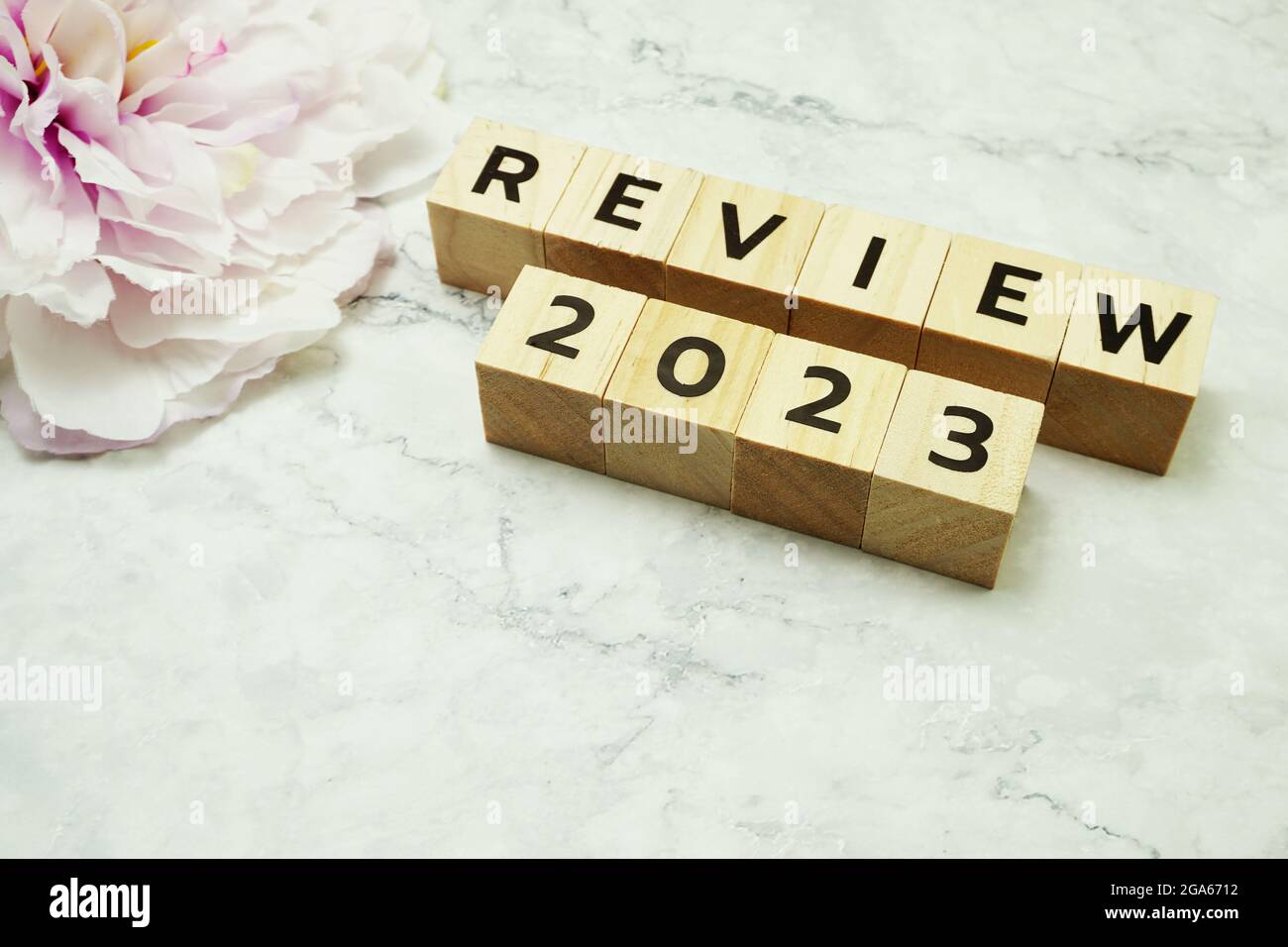 Review 2023 word alphabet letters on marble background Stock Photo - Alamy