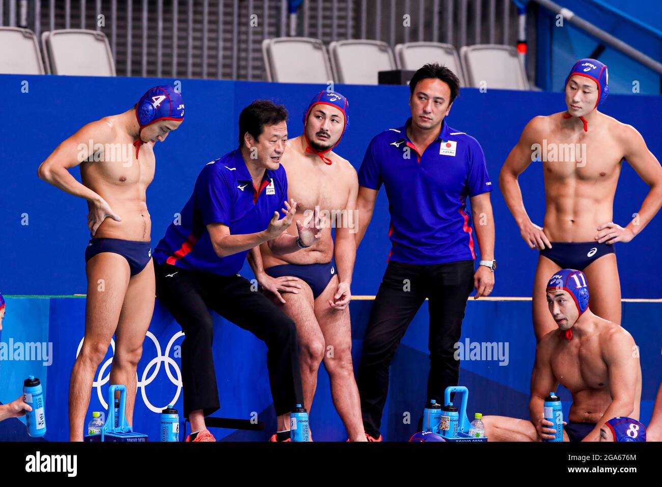 TOKYO, JAPAN - JULY 29: Mitsuaki Shiga of Japan, Head Coach Yoji Omoto of Japan, Yusuke Shimizu ...