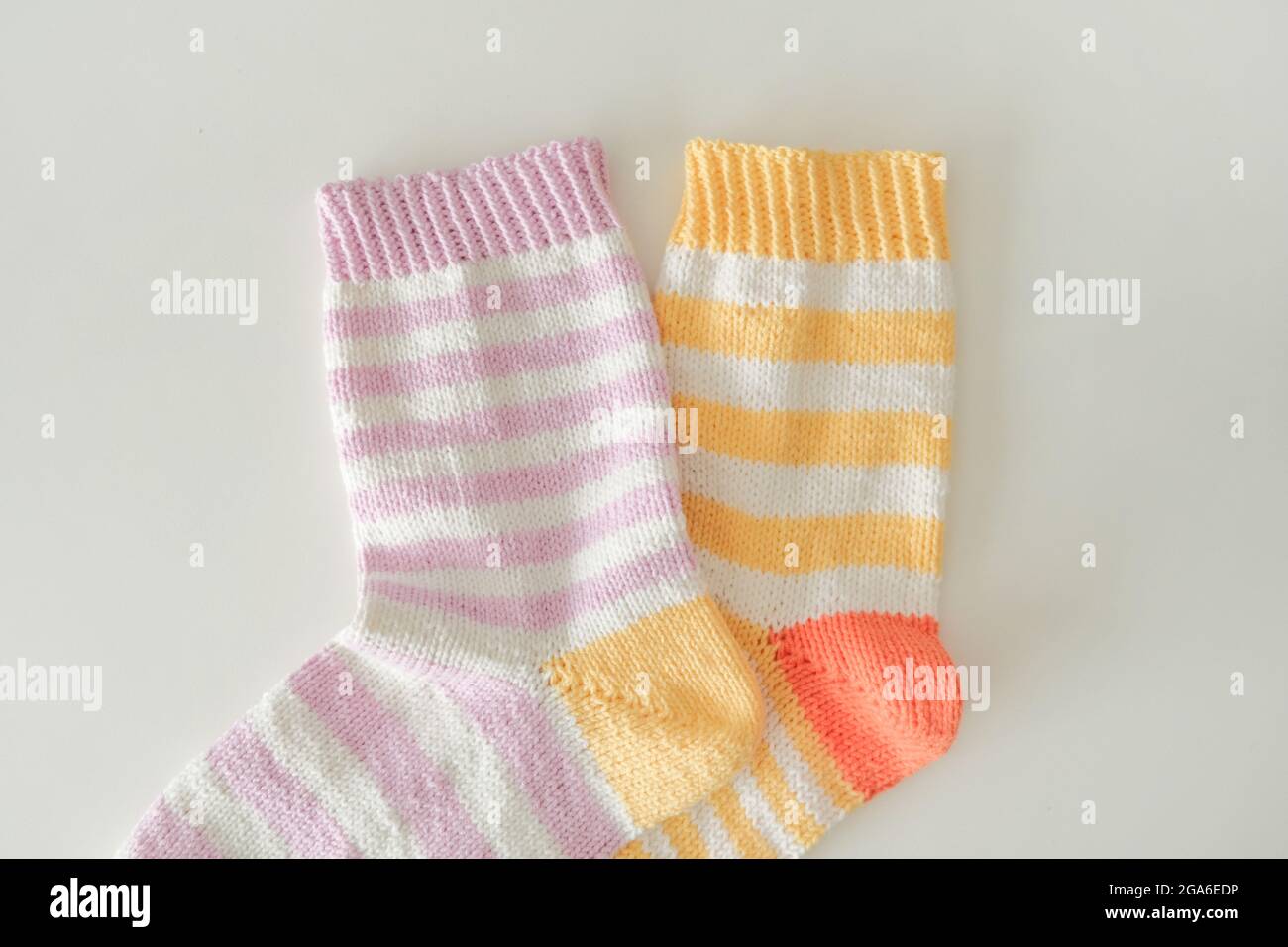 Colorful socks on white background Stock Photo - Alamy