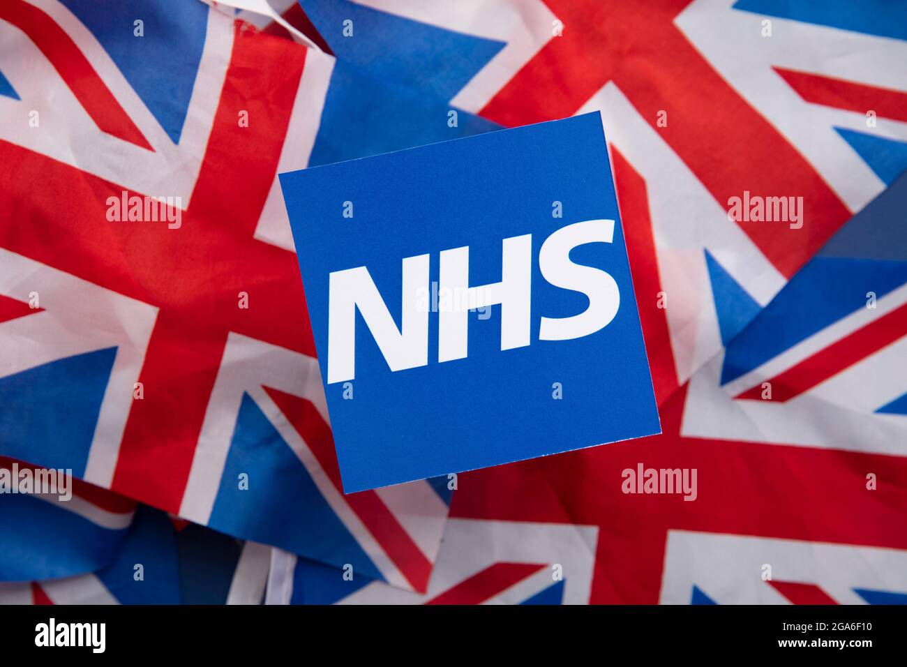 LONDON, UK - July 2021: NHS National health service logo on a union ...