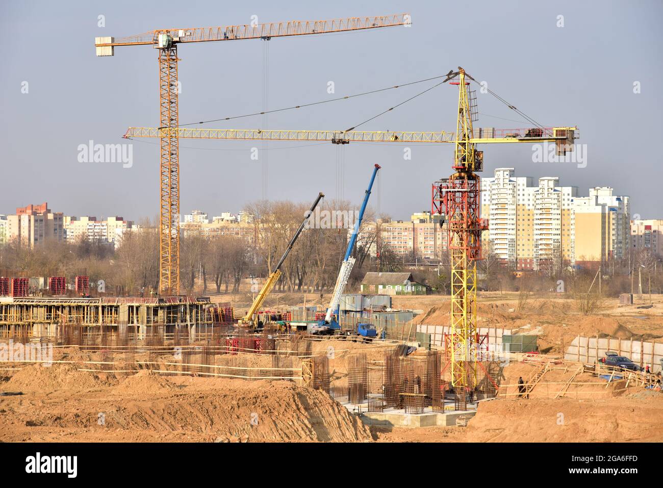 View of a large construction site. Tower cranes in action. Housing ...