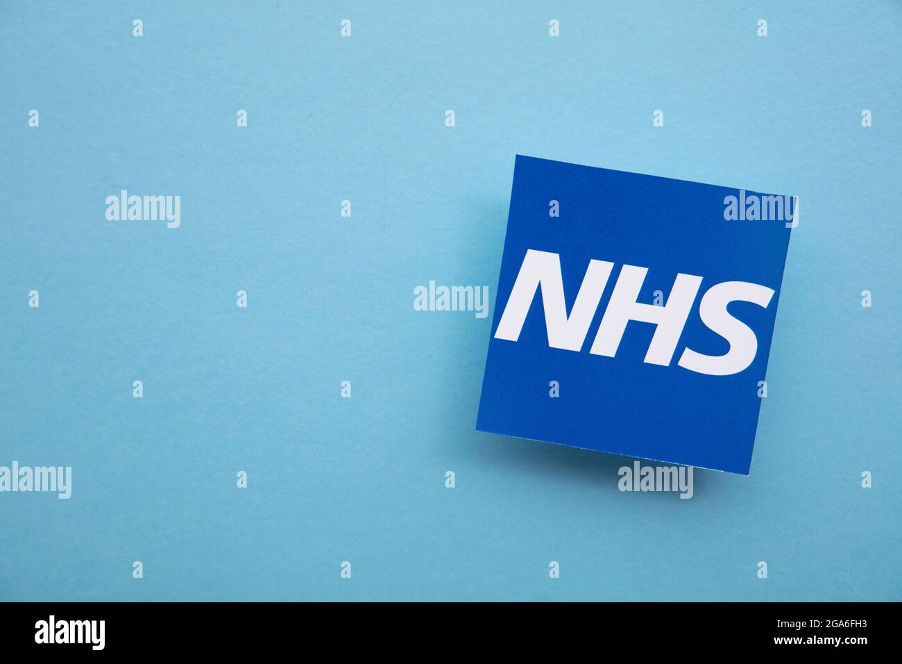 LONDON, UK - July 2021: NHS National health service logo on a blue ...