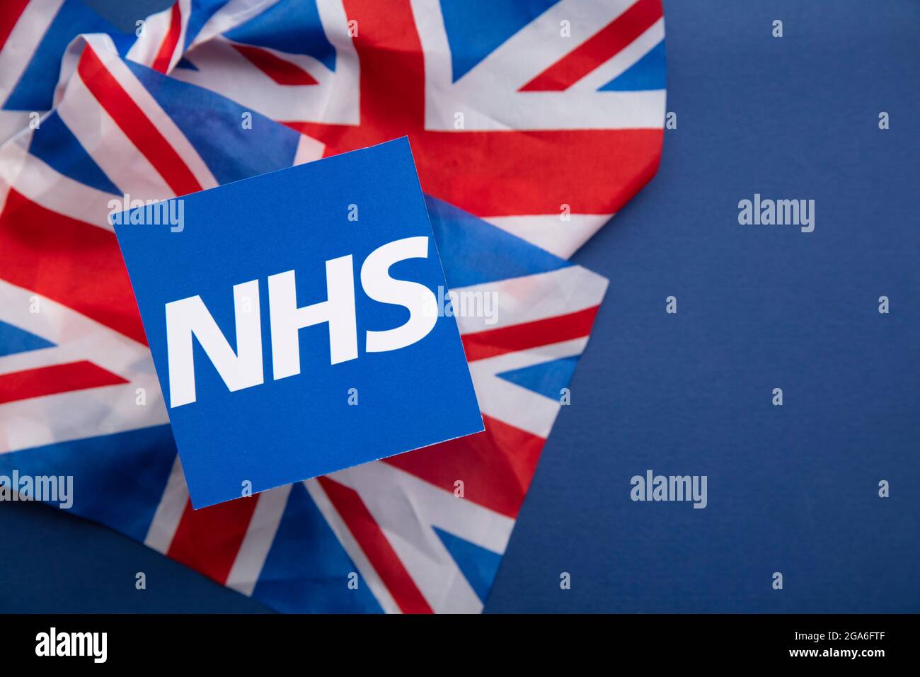 LONDON, UK - July 2021: NHS National health service logo on a union ...
