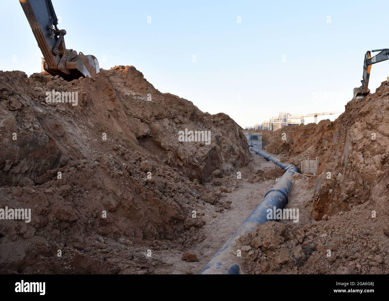 Laying sewer pipes. Sewage drainage system for a multi-story building ...