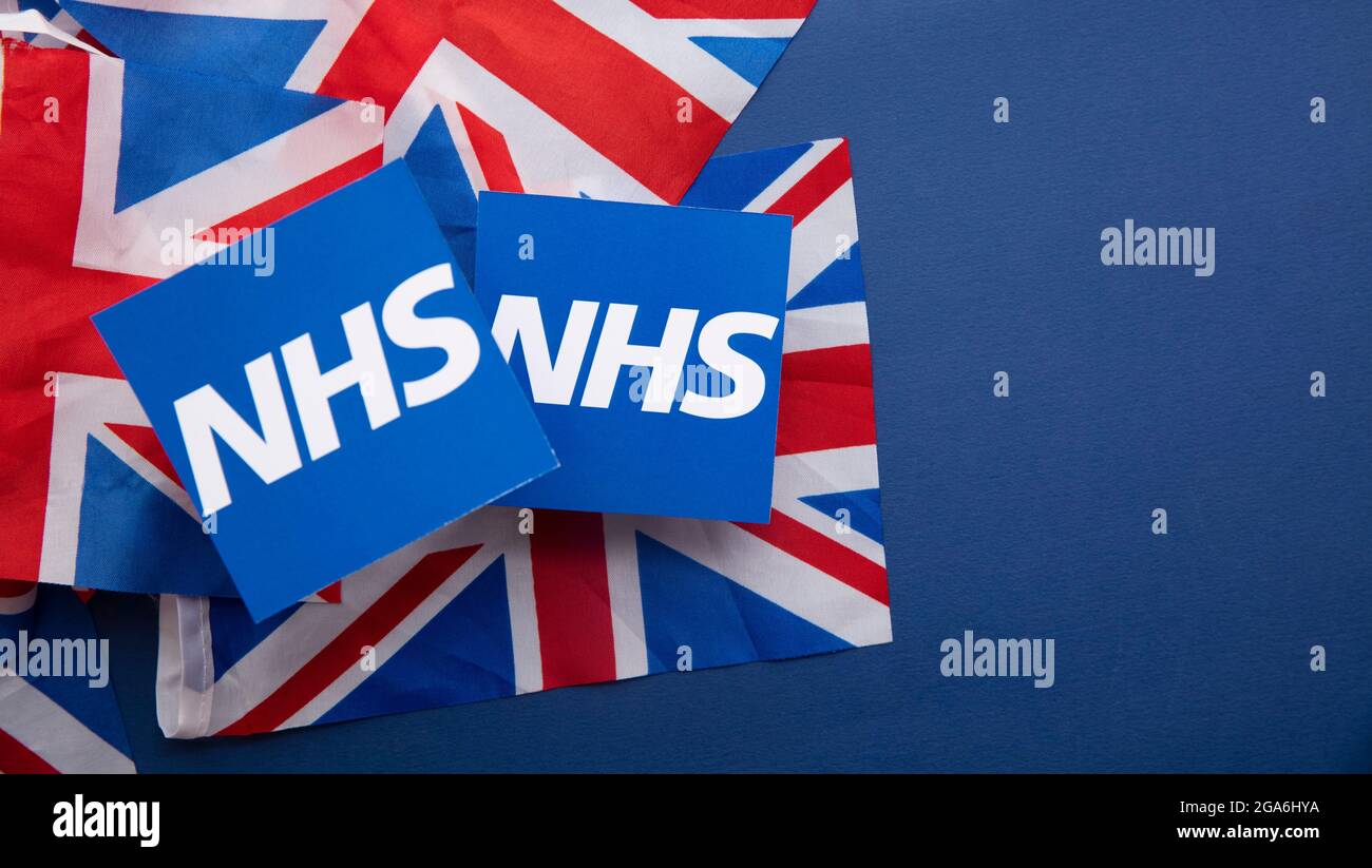 LONDON, UK - July 2021: NHS National health service logo on a union ...
