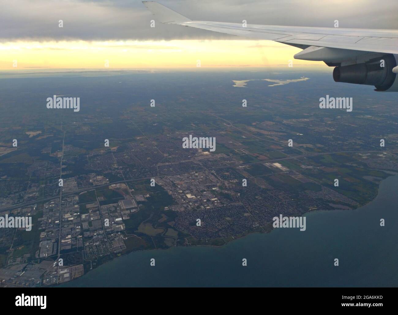 Aerial view of Toronto from airplane window seat/Lake Ontario/Toronto ...
