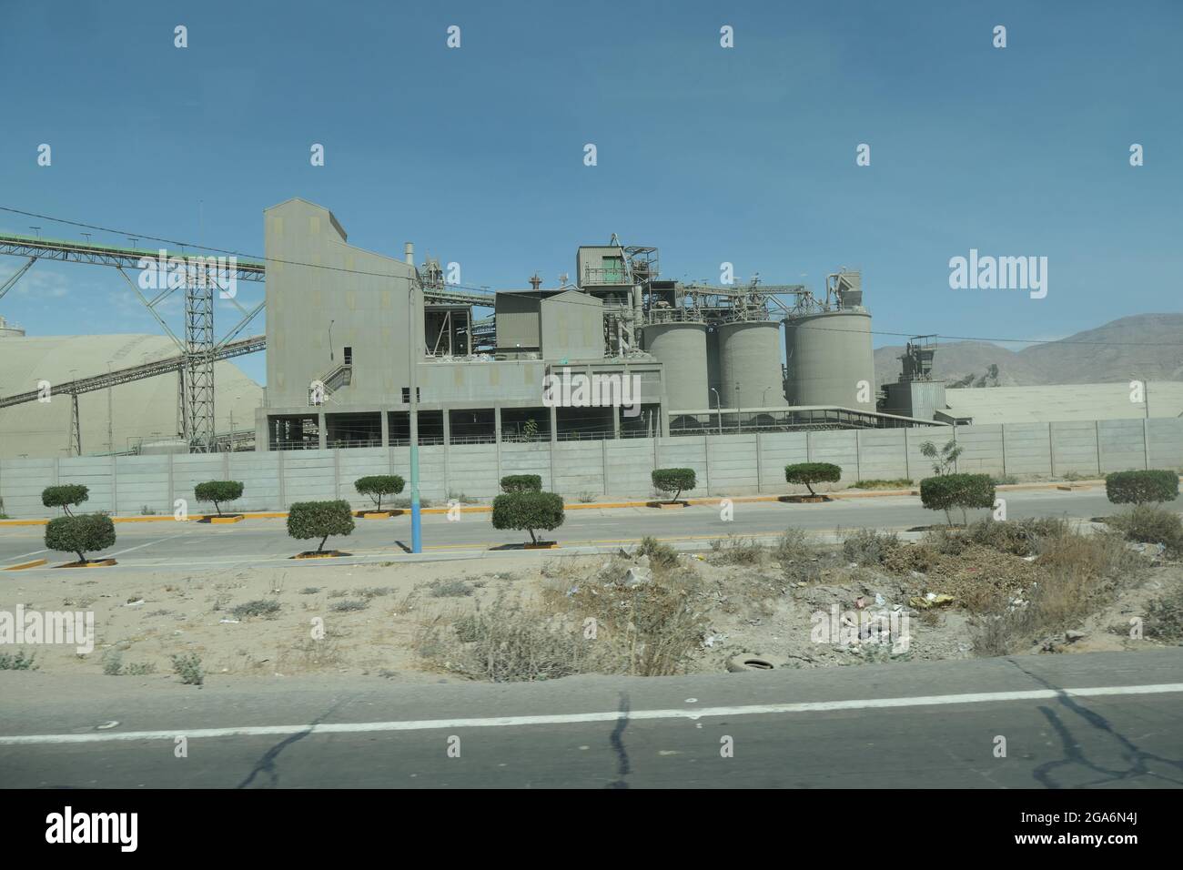 Peru landscape cement work collecting factory pipes building groundwork ...