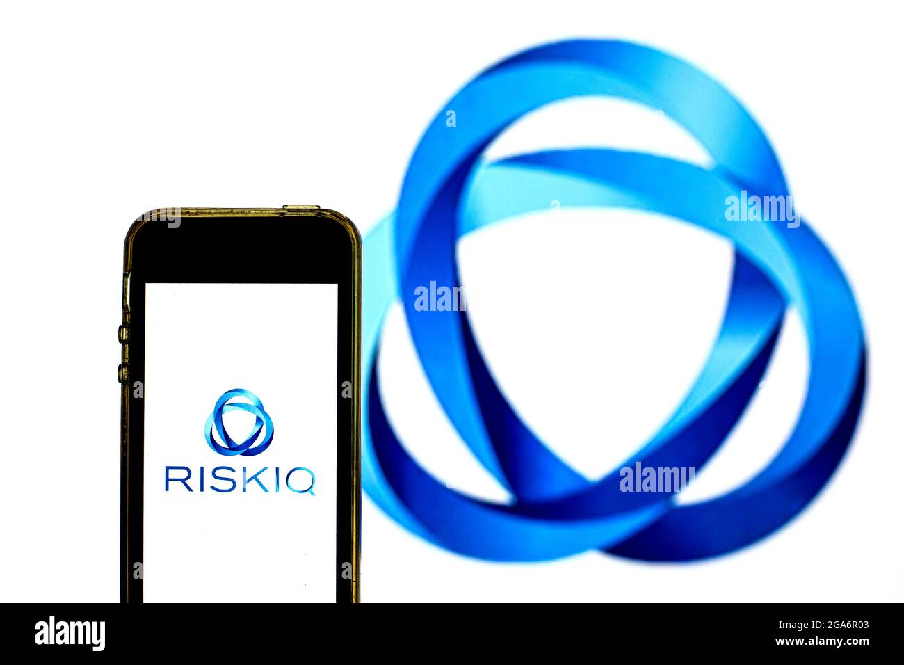 In this photo illustration a RiskIQ logo seen displayed on a smartphone ...