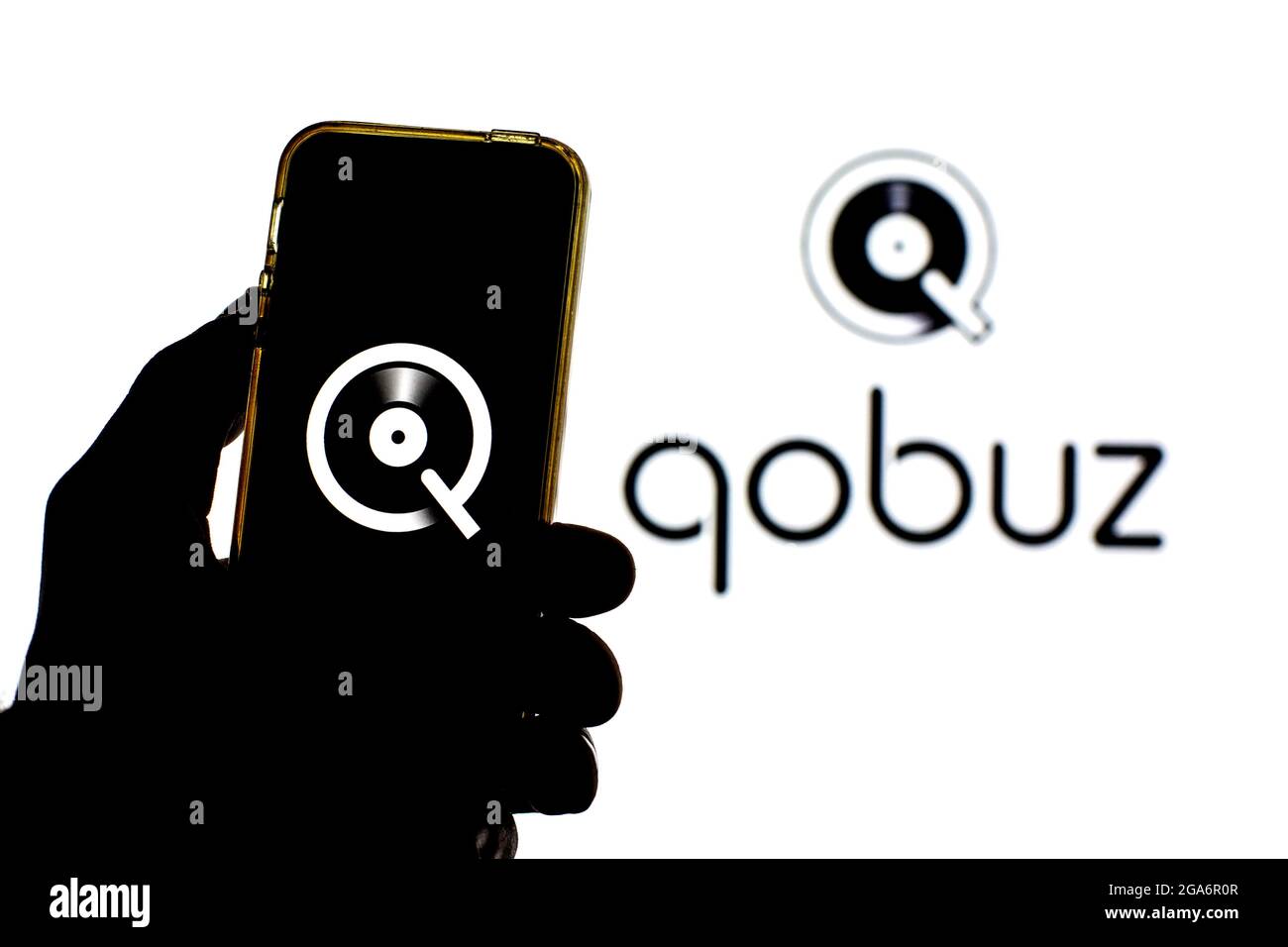 In this photo illustration a Qobuz logo seen displayed on a smartphone ...