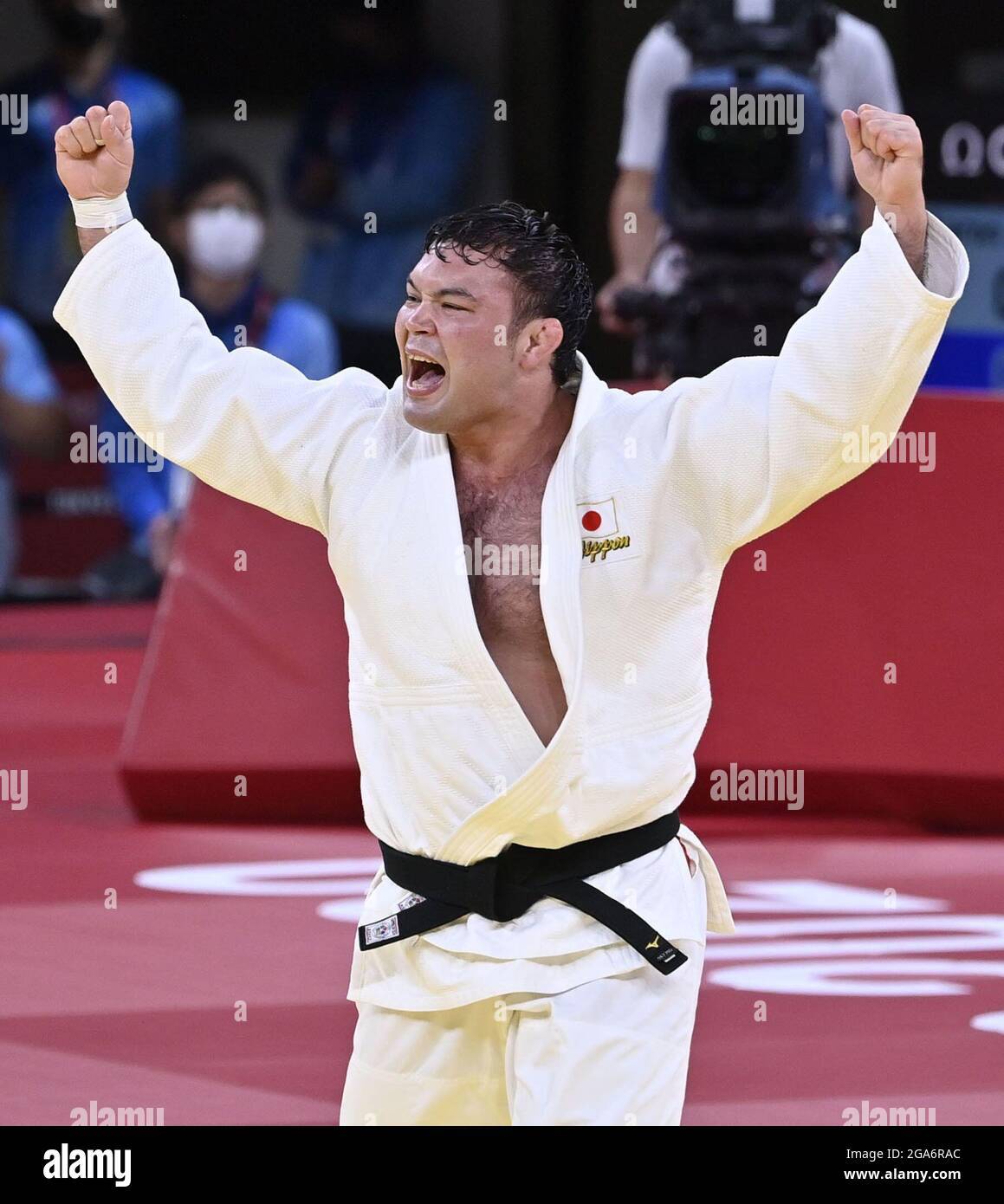 Japan's Aaron Wolf celebrates after winning the men's judo 100-kilogram ...