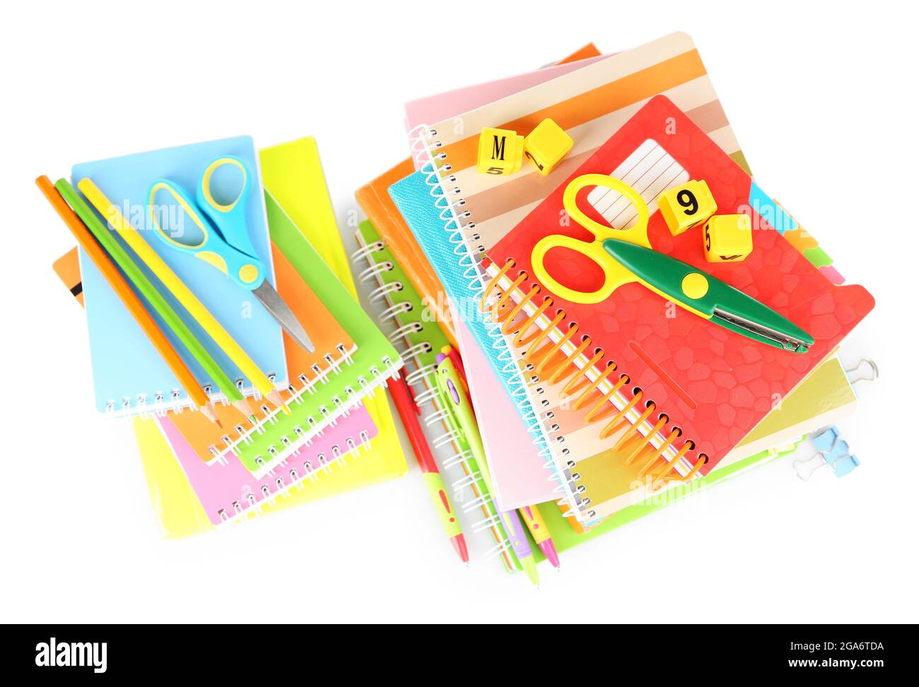 Stack of books and stationery isolated on white Stock Photo - Alamy