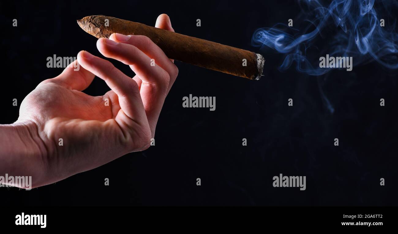 Hand Smoking Cigars Cigar High Resolution Stock Photography and Images ...