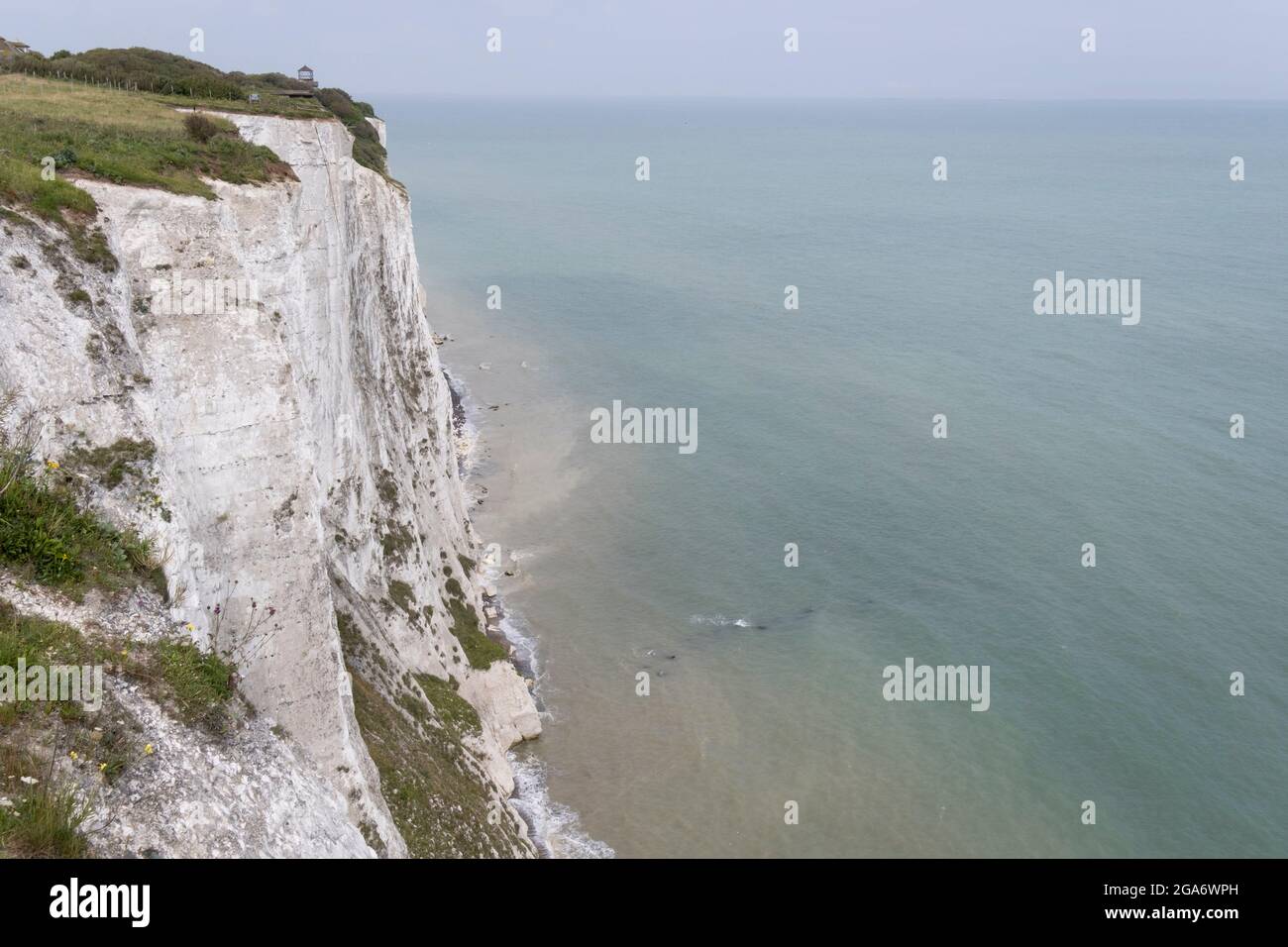 A hilltop landscape of England's iconic White Cliffs, under threat from ...
