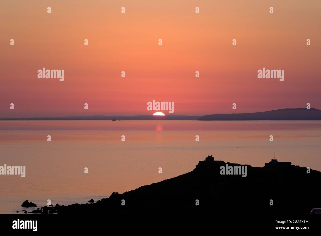 The sun rising over St Ives Bay in Cornwall, UK Stock Photo - Alamy