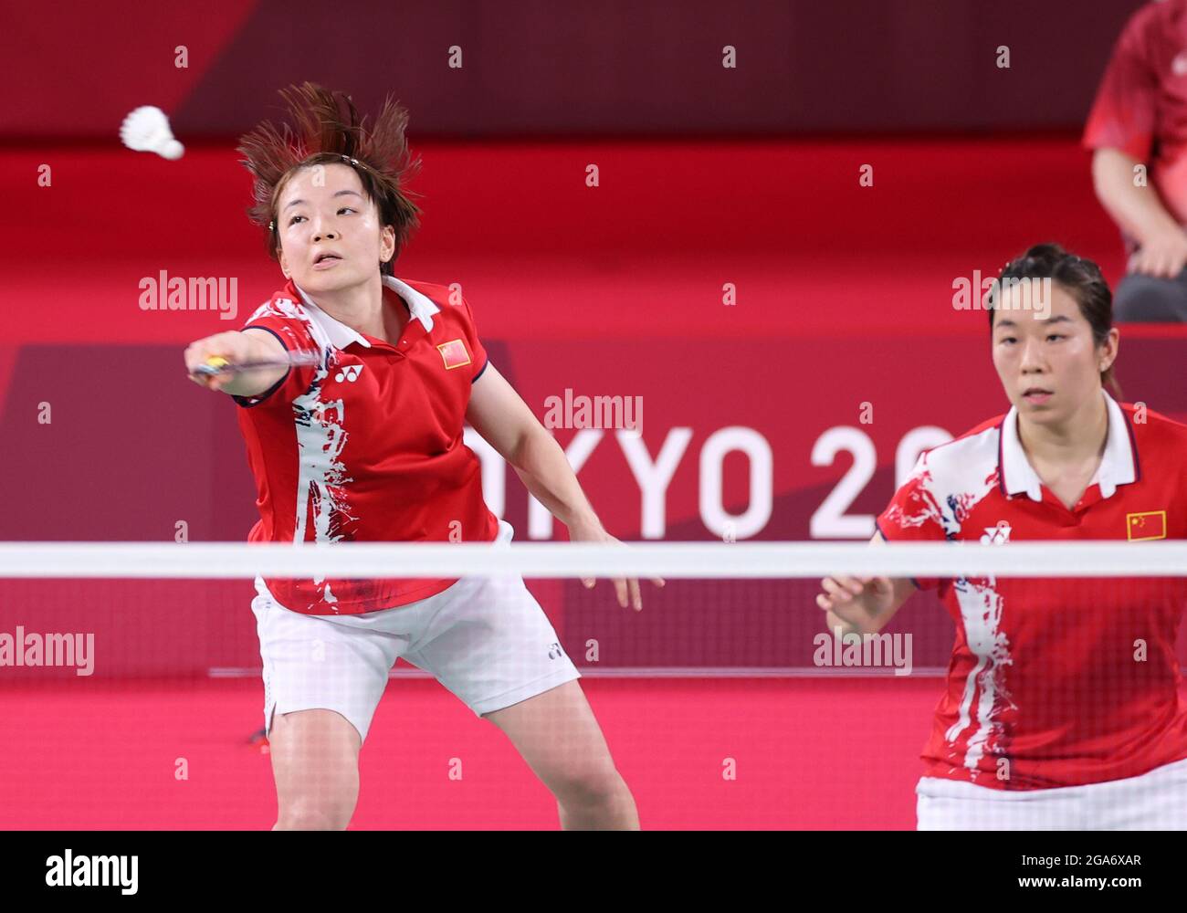 Tokyo, Japan. 29th July, 2021. China's Chen Qingchen/Jia Yifan (R) compete during the badminton ...