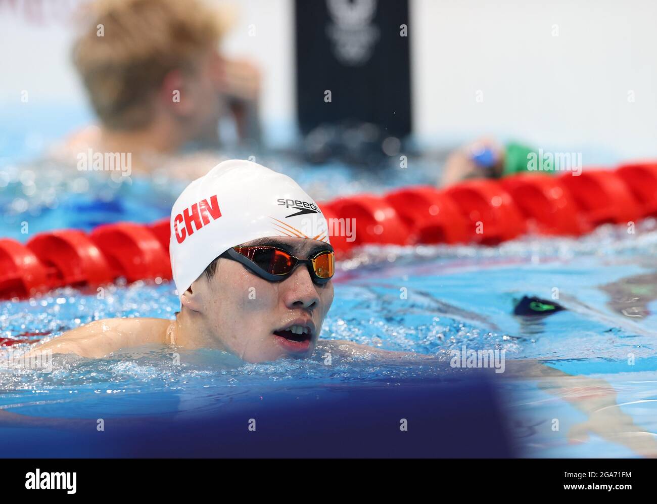 Tokyo, Japan. 29th July, 2021. Sun Jiajun of China reacts after the heats of men's 100m ...