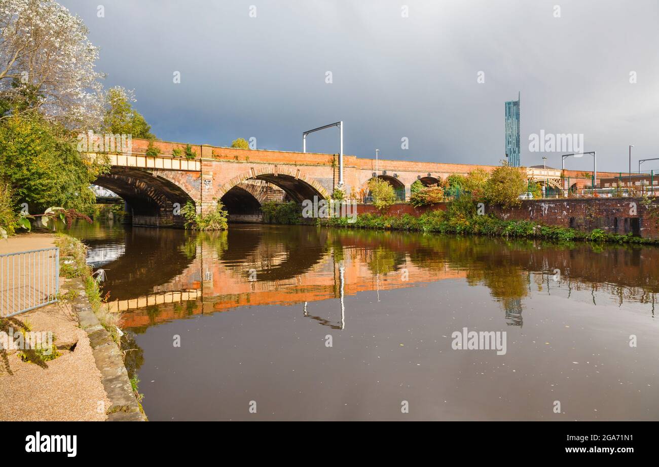 Castlefield Viaduct railway bridge crossing over the River Irwell ...