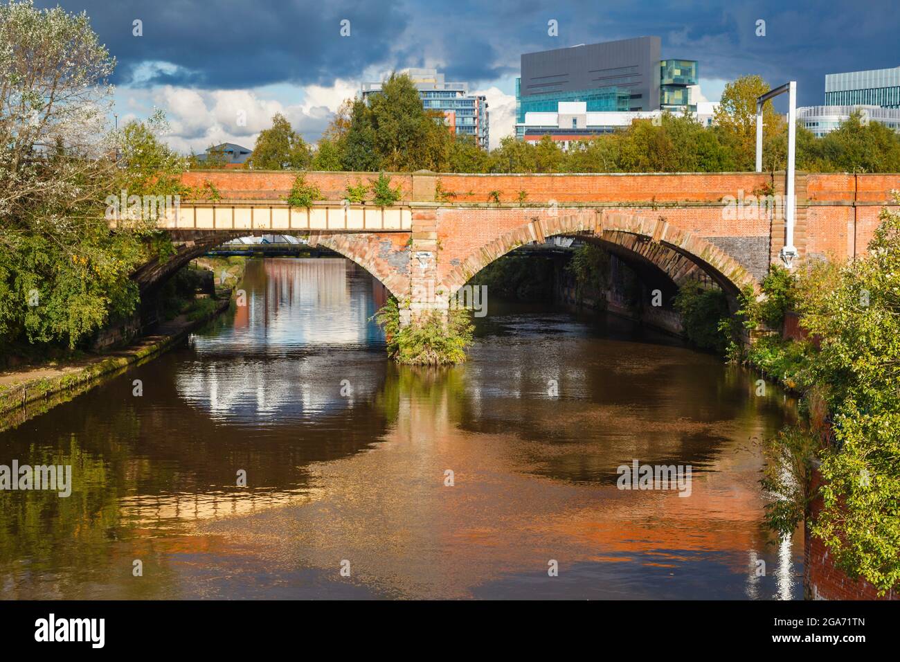 Castlefield Viaduct railway bridge crossing over the River Irwell ...