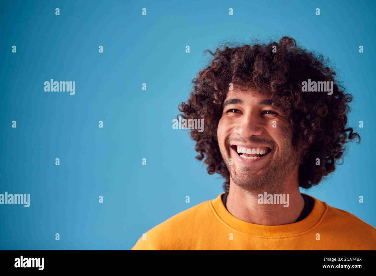 Man against blue background hi-res stock photography and images - Alamy