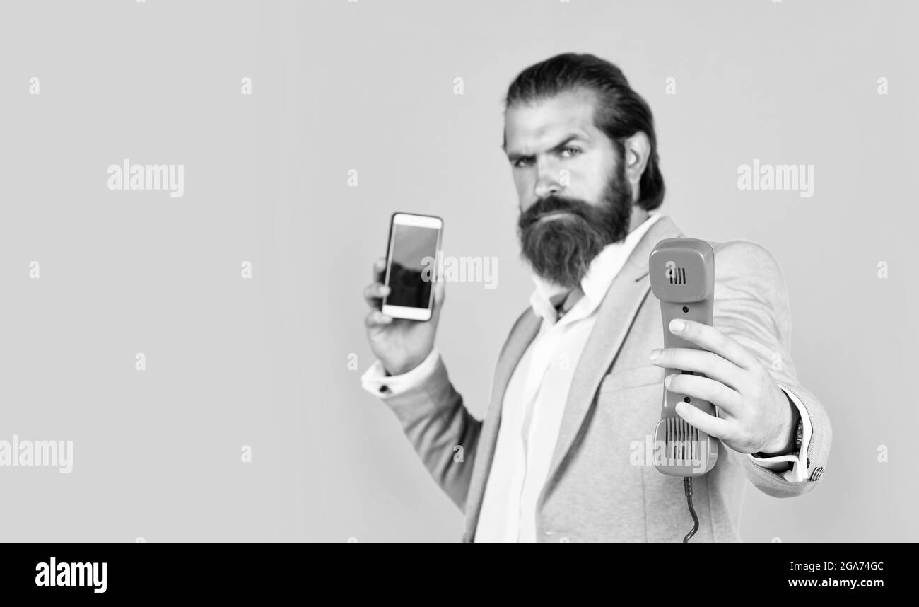 Retro man talking on phone. Modern mobile phone and old vintage classic ...