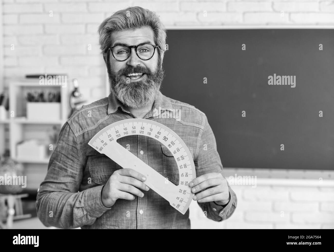 Math subject. Study mathematics. Man teacher mentoring school projects ...