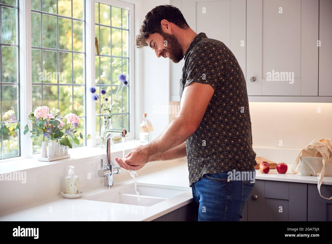 Man Washing Hands With Soap At Home To Stop Spread Of Infection In ...