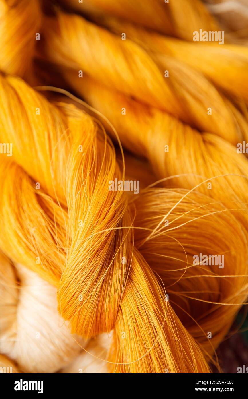 Bright color of raw silk threads Stock Photo - Alamy