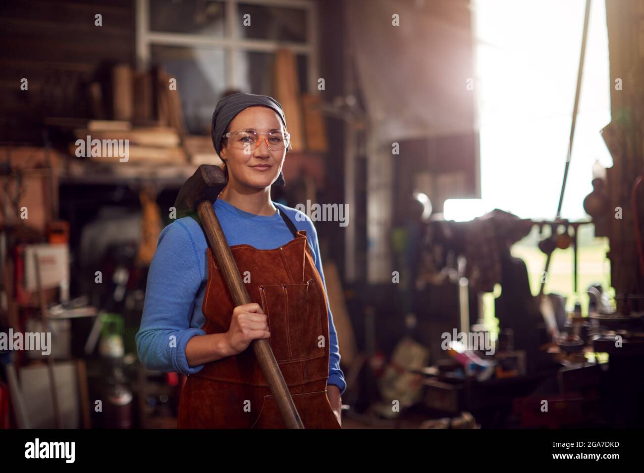 Woman blacksmith working in forge hi-res stock photography and images ...
