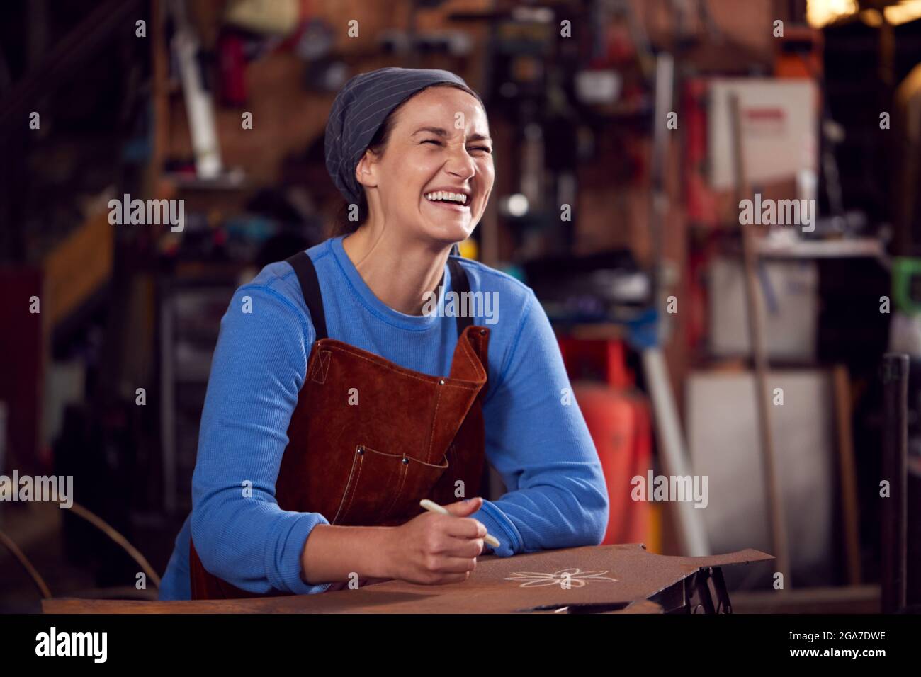 Woman blacksmith working in forge hi-res stock photography and images ...