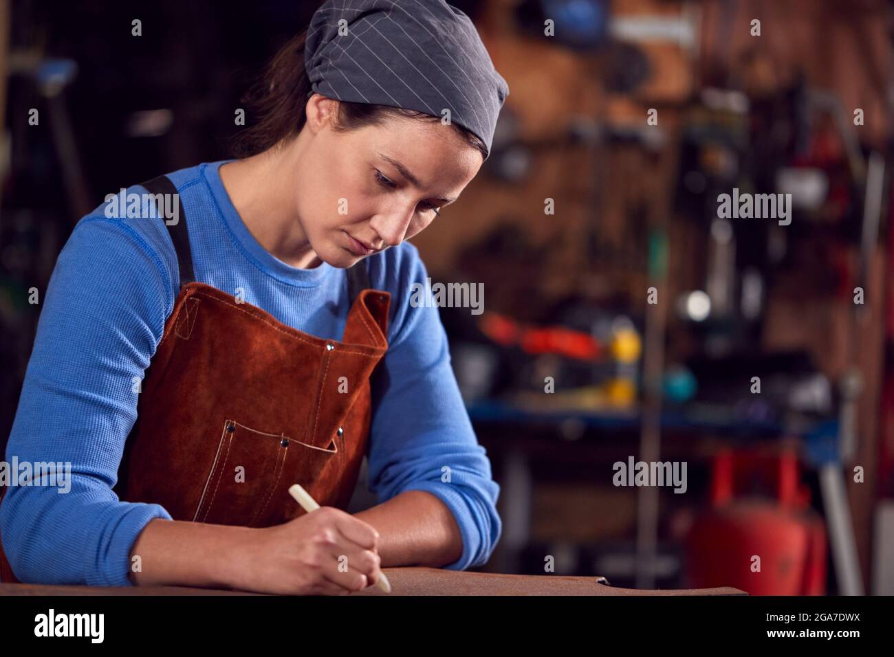 Woman blacksmith working in forge hi-res stock photography and images ...
