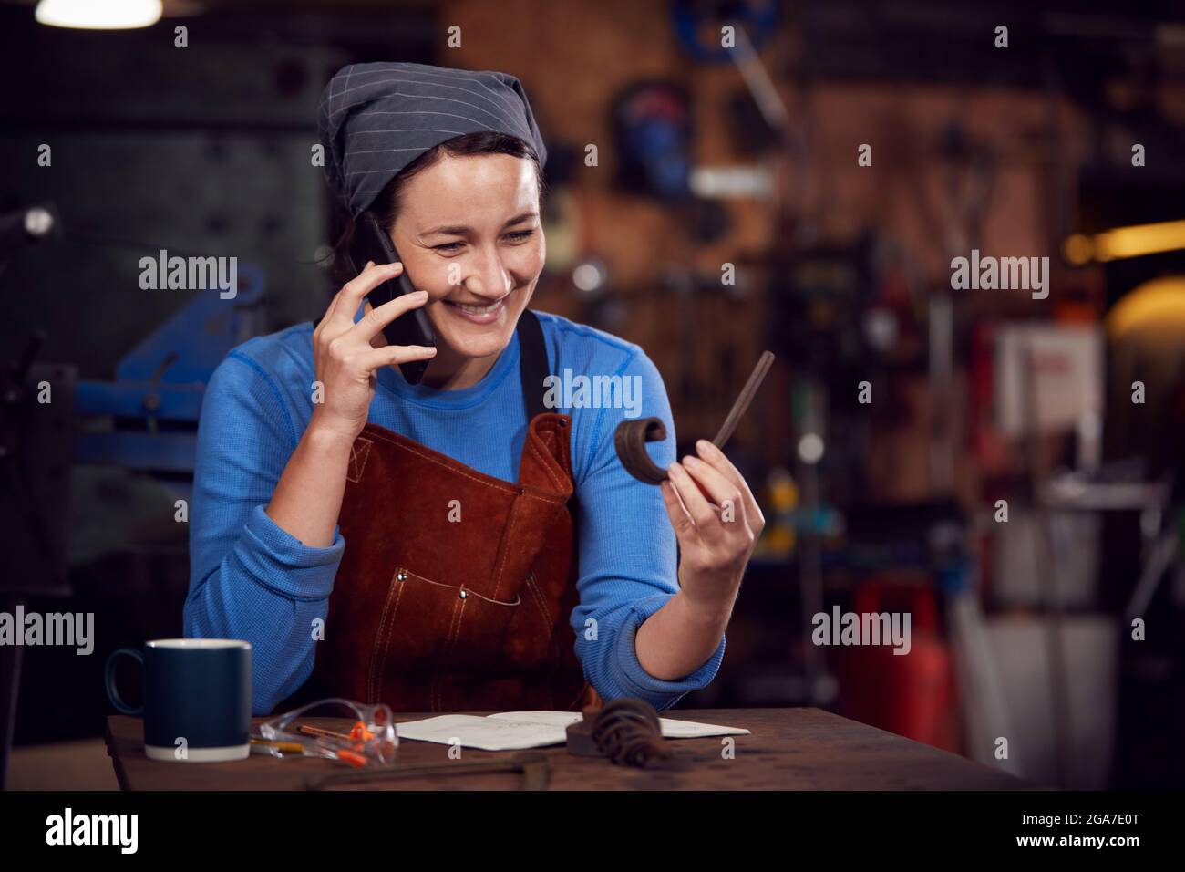 Woman blacksmith working in forge hi-res stock photography and images ...