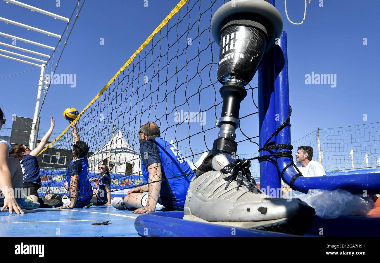 Volleyball with disabled players, during a sports summer camp, in Milan ...
