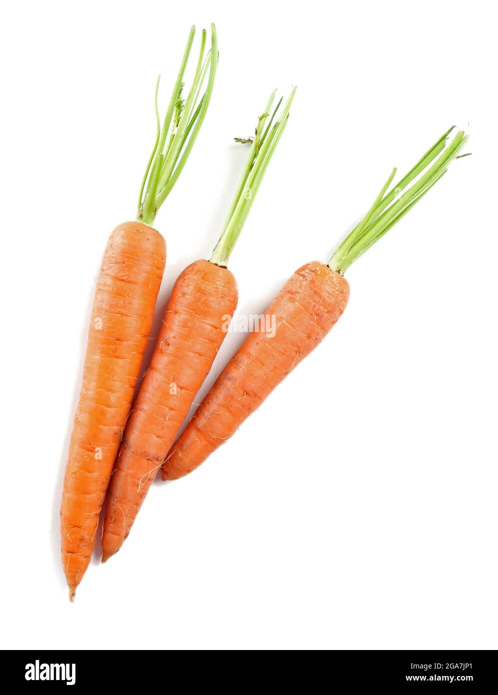 Fresh carrots isolated on white Stock Photo - Alamy