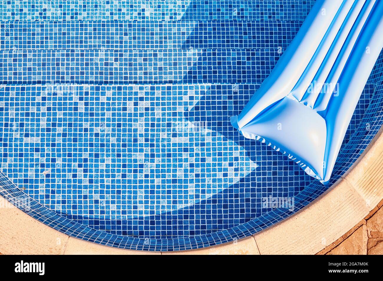 Overhead Shot Of Inflatable Airbed Floating In Outdoor Swimming Pool ...