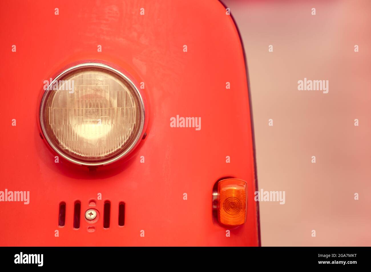 Vintage style motorcycle light with red body Stock Photo - Alamy