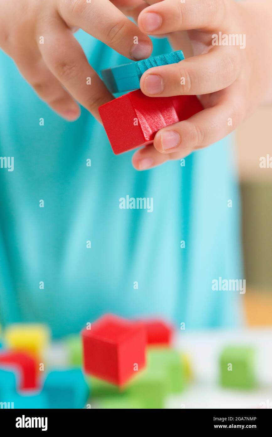 Boy Playing Building Wooden Blocks Stock Photo - Alamy