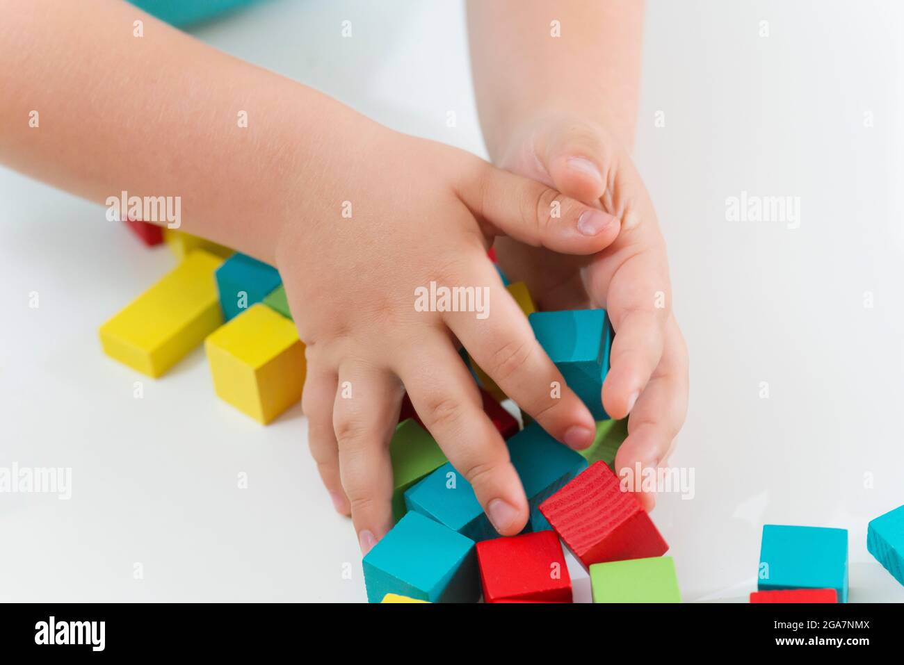 Boy Playing Building Wooden Blocks Stock Photo - Alamy