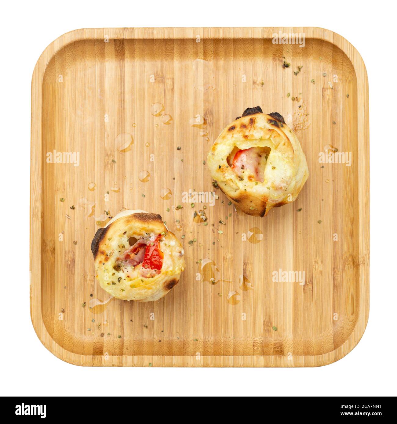 Pizzetti on a wooden plate. Variety of pizza isolated on white ...