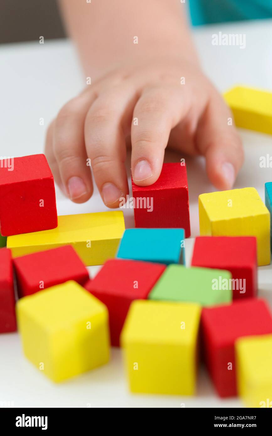 Boy Playing Building Wooden Blocks Stock Photo - Alamy